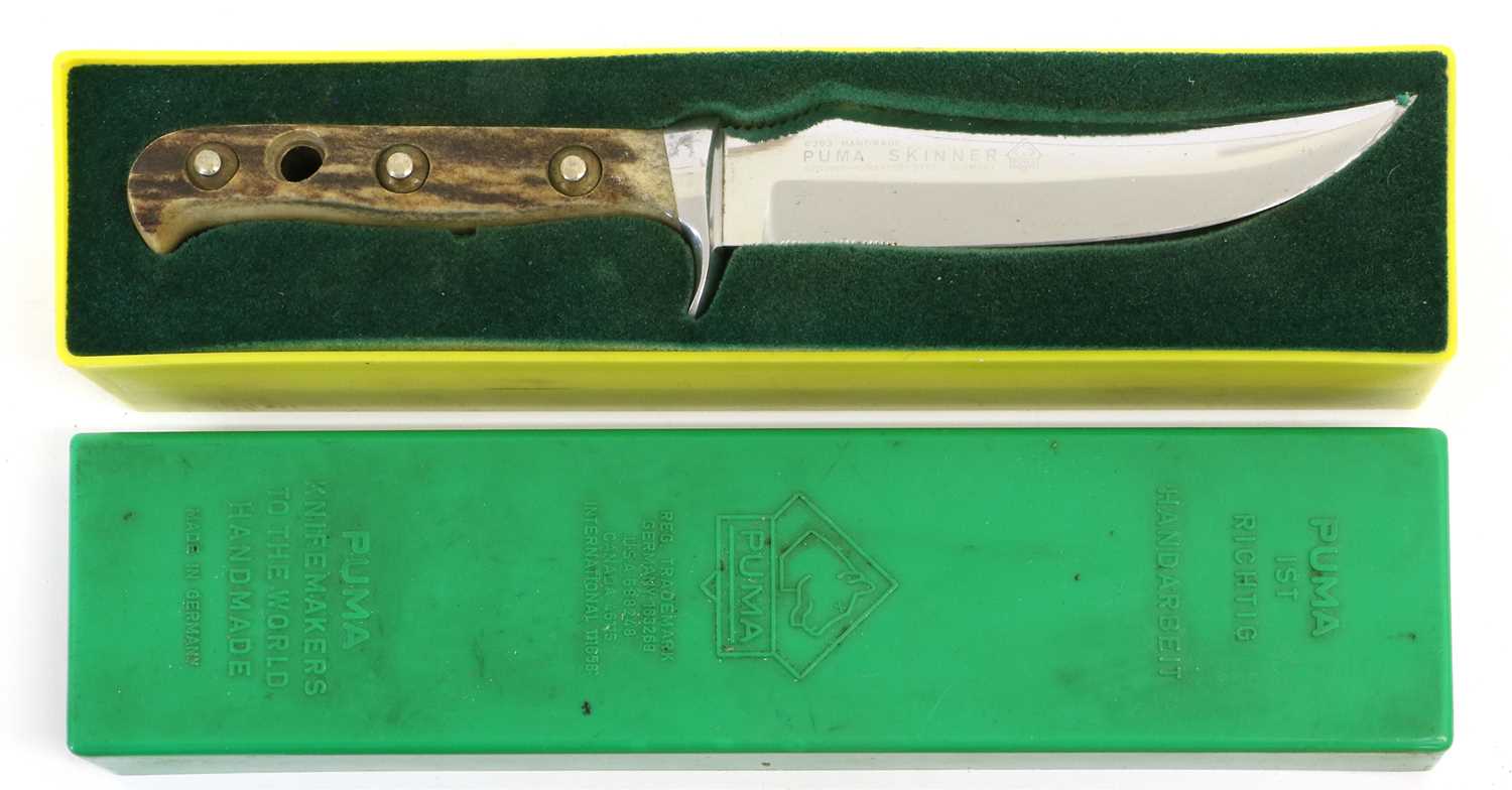 Lot 239 - A Puma Skinner Knife, with 13cm up-turned