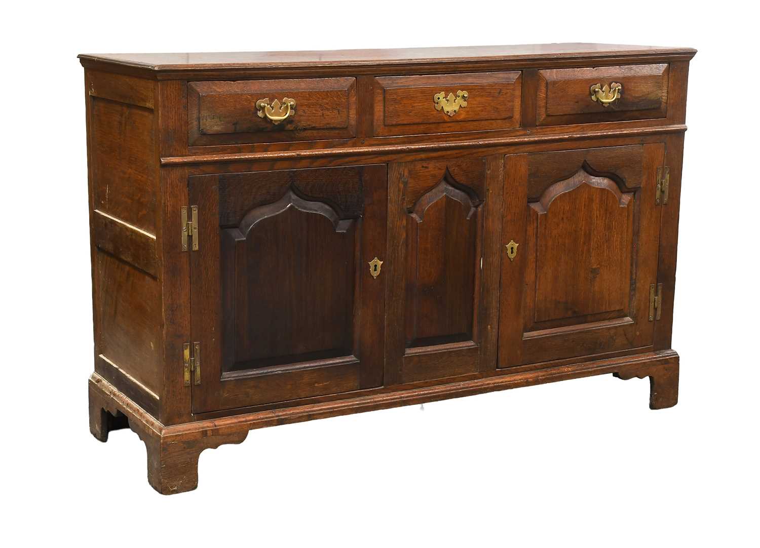 Lot 1404 - A Reproduction Oak Sideboard, with three
