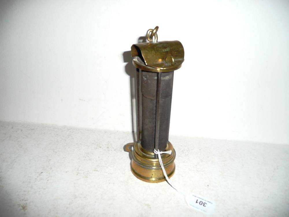 Lot 301 - An Early Miners Brass Davy Lamp by Laidler,